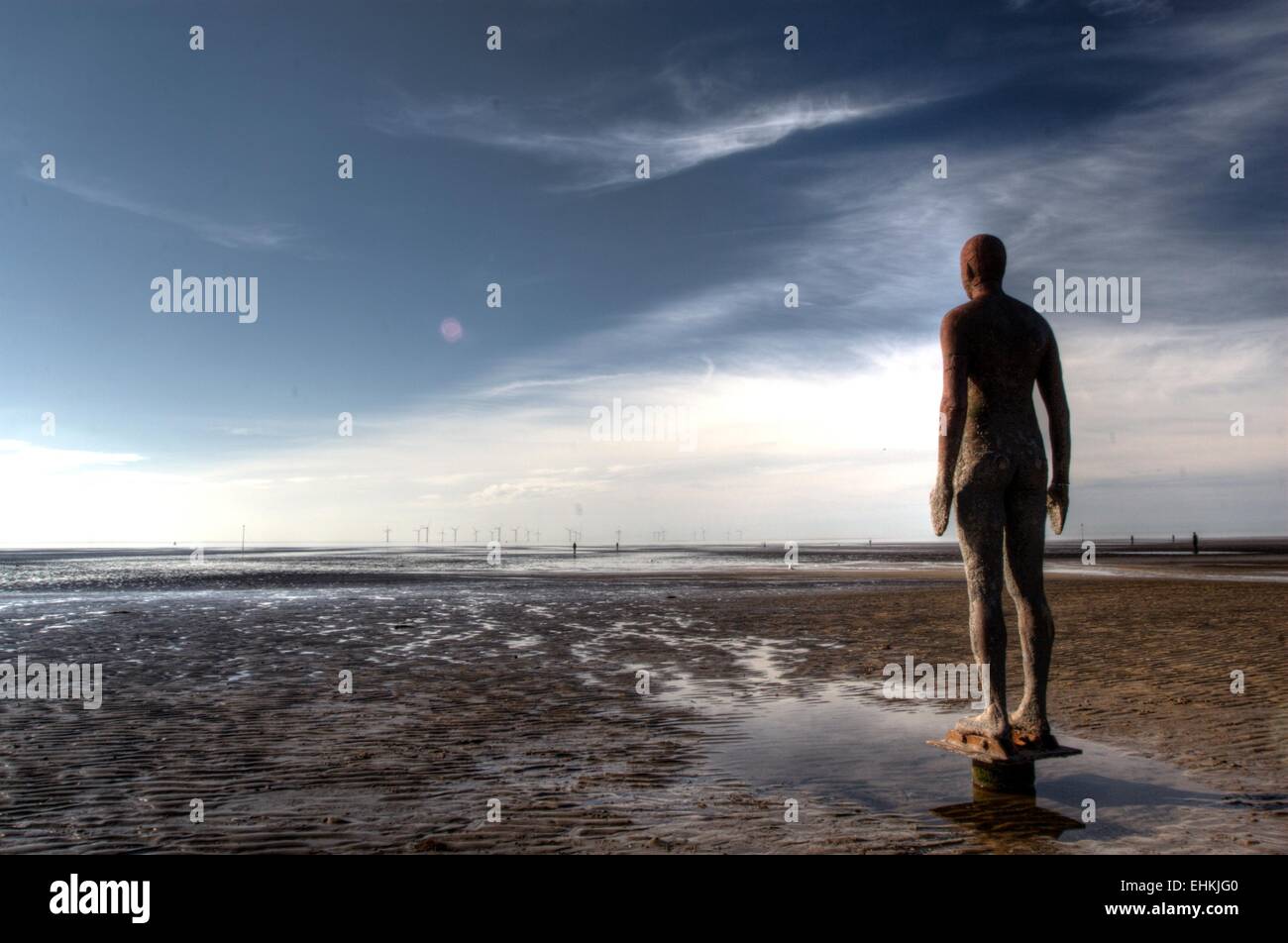 Another Place statue by Anthony Gormley, Liverpool, UK Stock Photo - Alamy