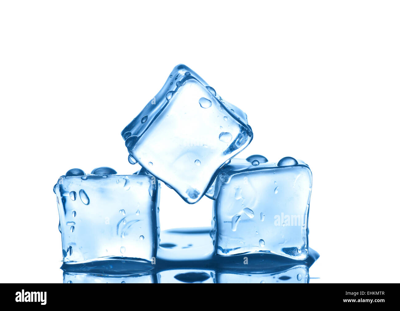 Three ice cubes on white background Stock Photo - Alamy