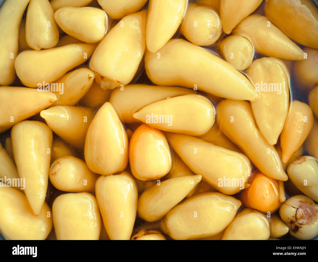 Pickled turkish peppers as a background Stock Photo - Alamy