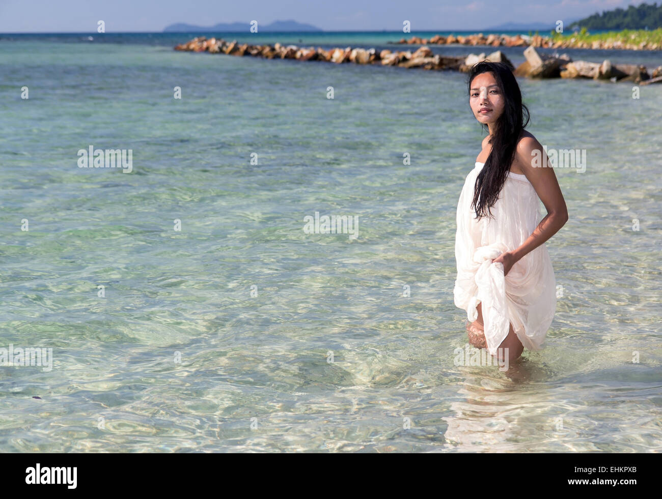 Woman in wet dress coast hi-res stock photography and images - Alamy