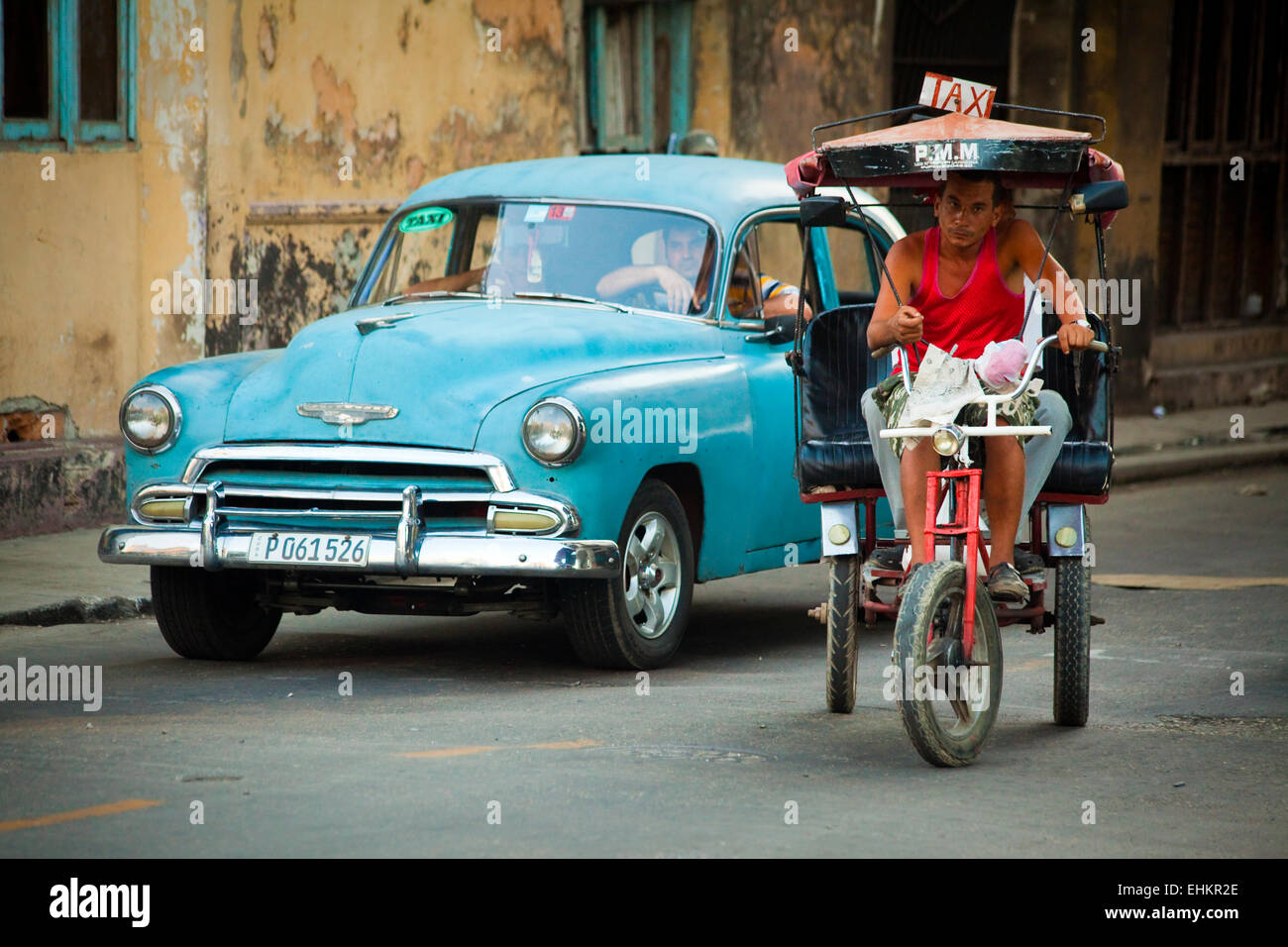 Classic car and bicycle taxi, Havana, Cuba Stock Photo - Alamy