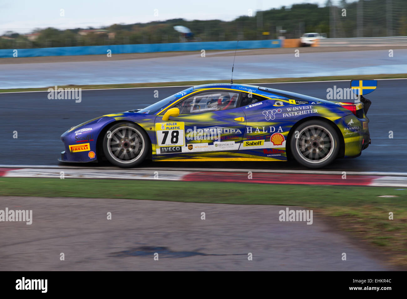 ISTANBUL, TURKEY - OCTOBER 25, 2014: Martin Nelson drives Ferrari 458 ...