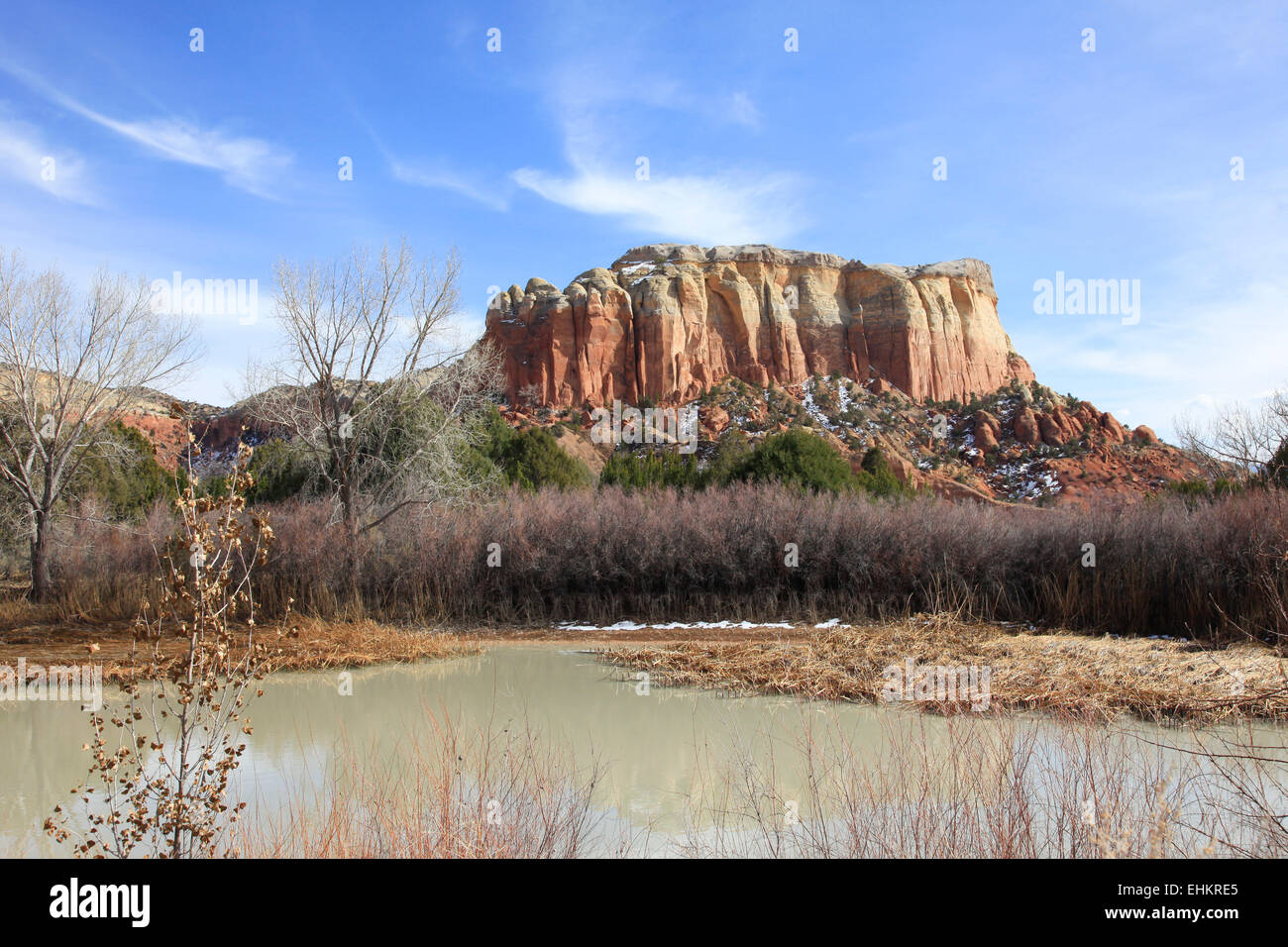 Red rocks of Kitchen Mesa New Mexico USA with a lake Stock Photo - Alamy