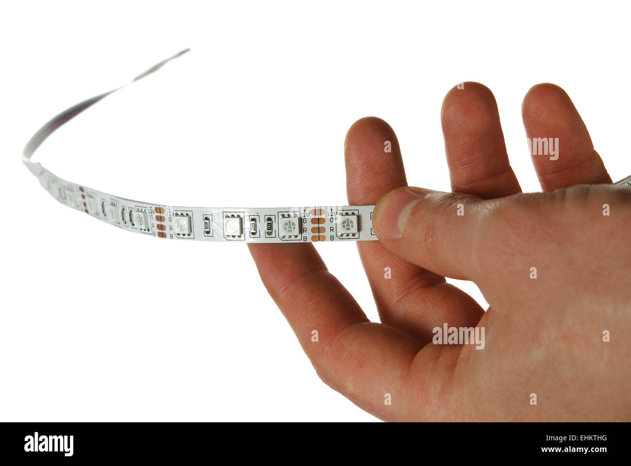 man holding a LED stripe in hand on the white background Stock Photo ...