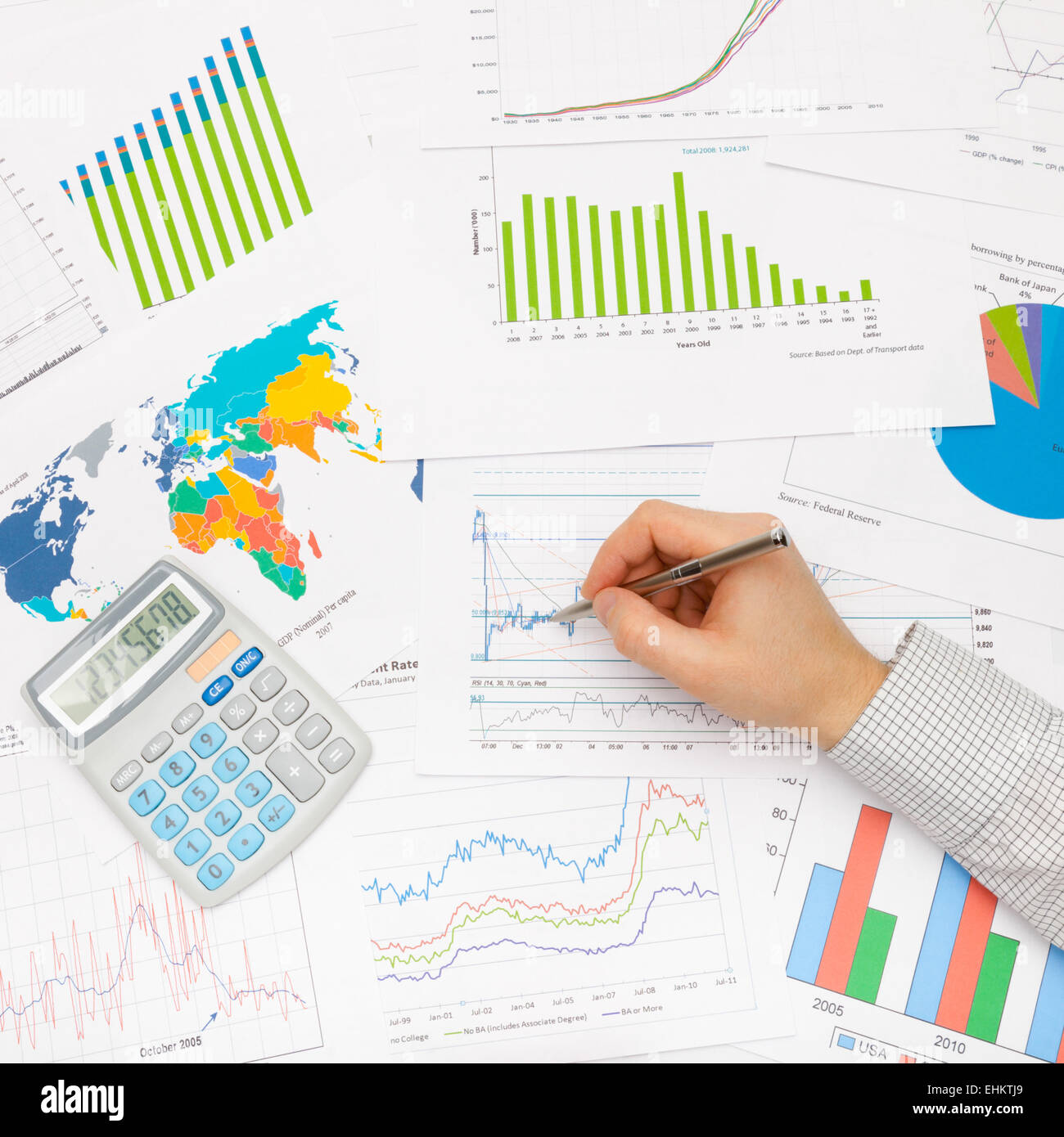Business man working with financial data - studio shot Stock Photo - Alamy