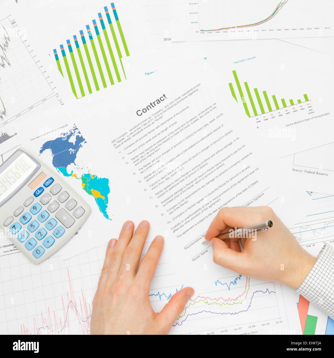 Business man working with financial data - signing contract - studio ...