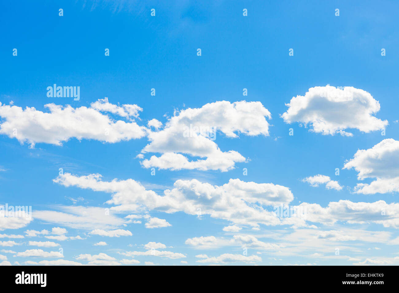 Cumulus clouds, blue sky and sun - outdoors shoot Stock Photo - Alamy
