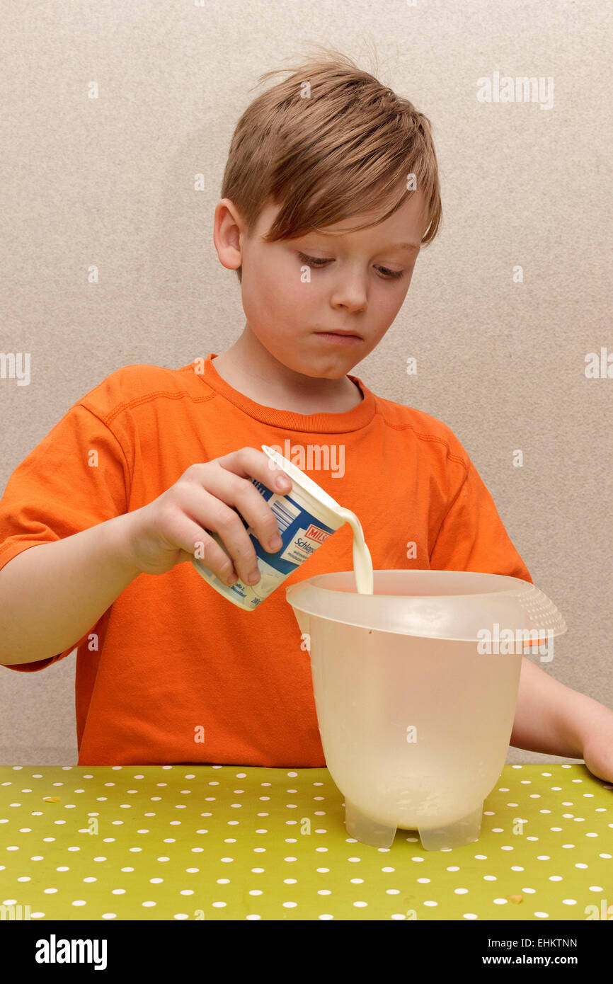 Boy making whipped cream hi-res stock photography and images - Alamy