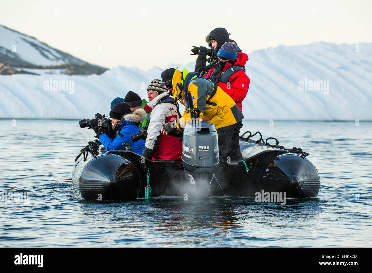 photographers on expedition photographing, Pleneau Bay, Antarctica ...