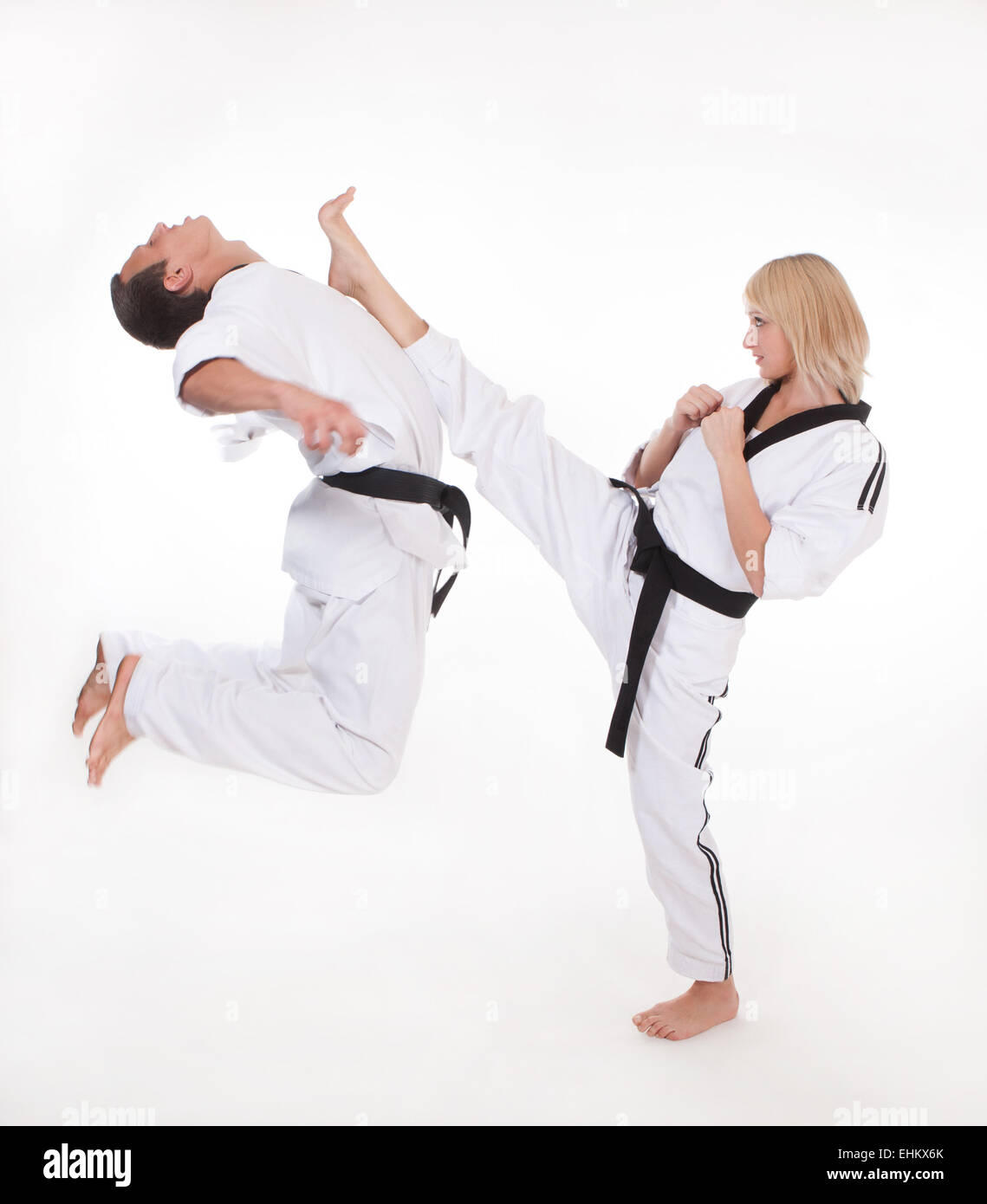 Kick to head in close fight Stock Photo - Alamy