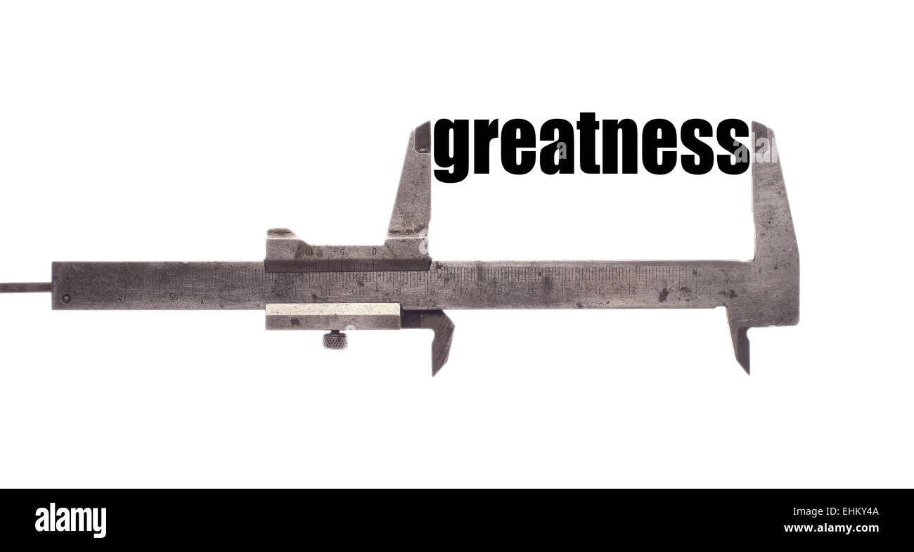 Color horizontal shot of a caliper, measuring the word "greatness Stock ...
