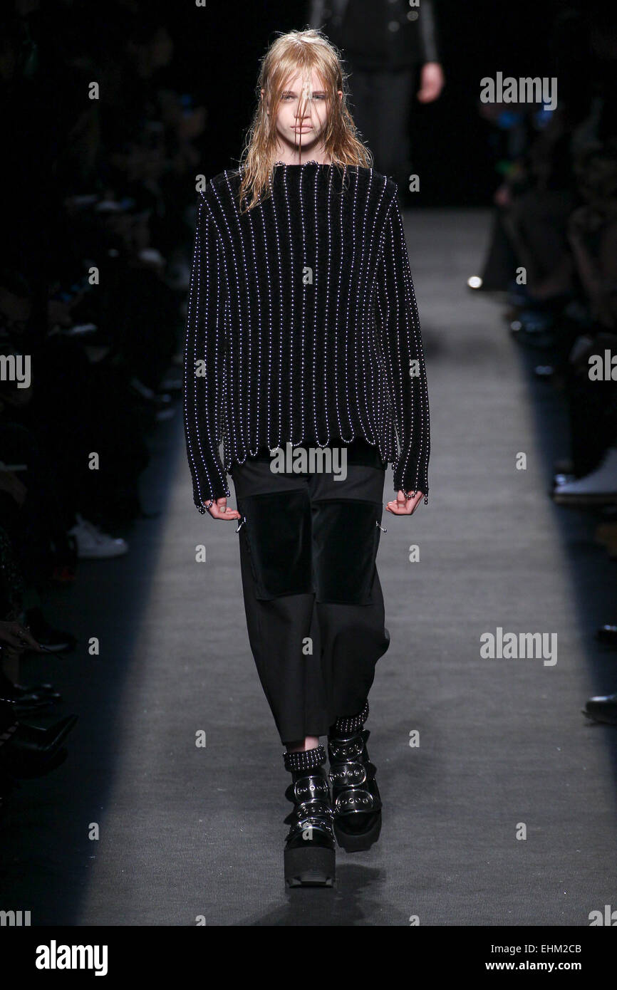 A model walks the runway wearing Alexander Wang during MBFW Fall 2015 ...
