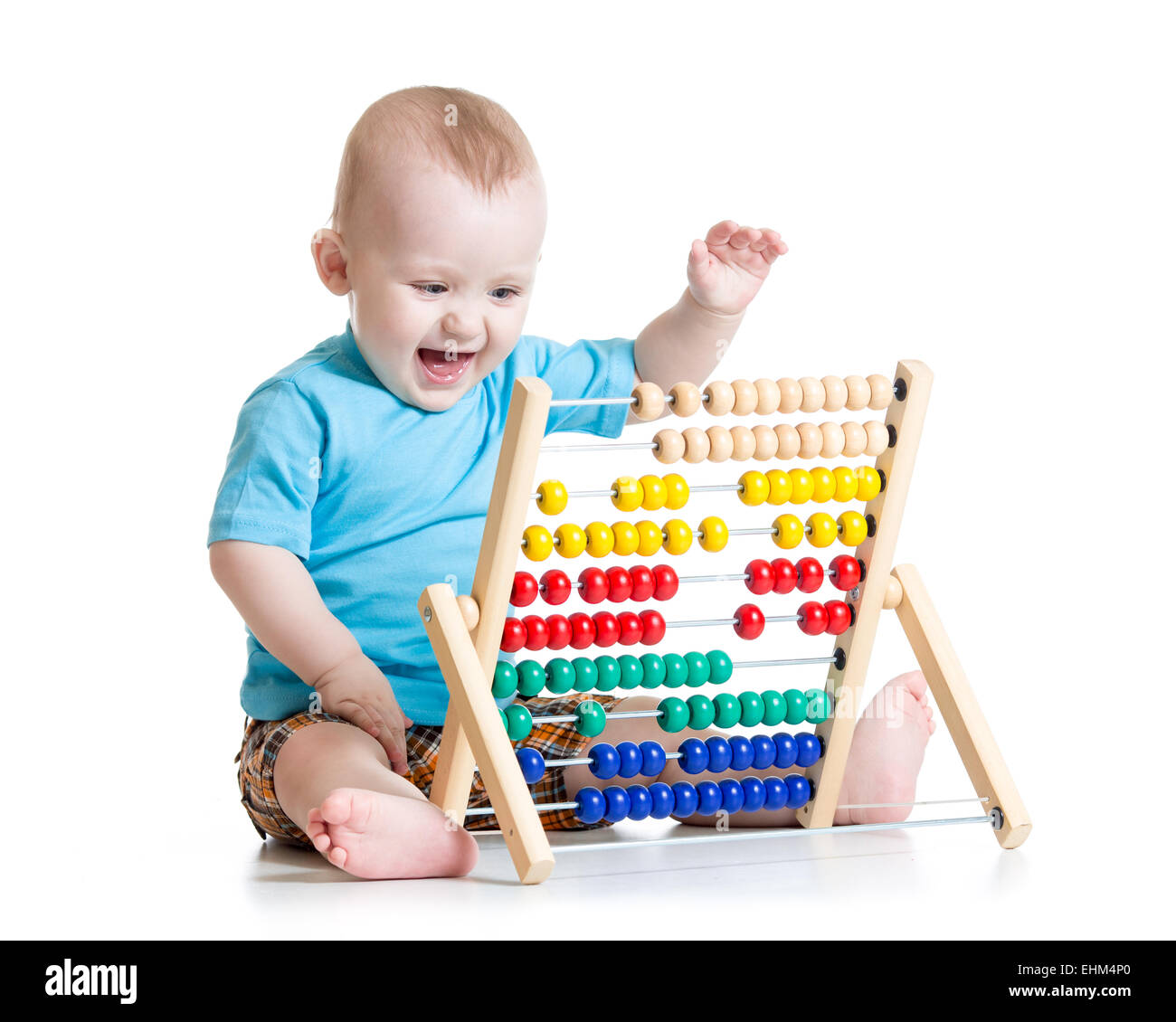 Baby playing with abacus toy Stock Photo - Alamy