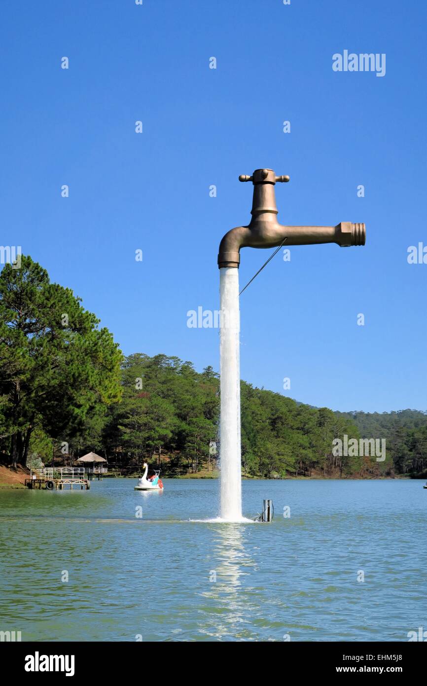 Free standing faucet floating over a lake Stock Photo - Alamy