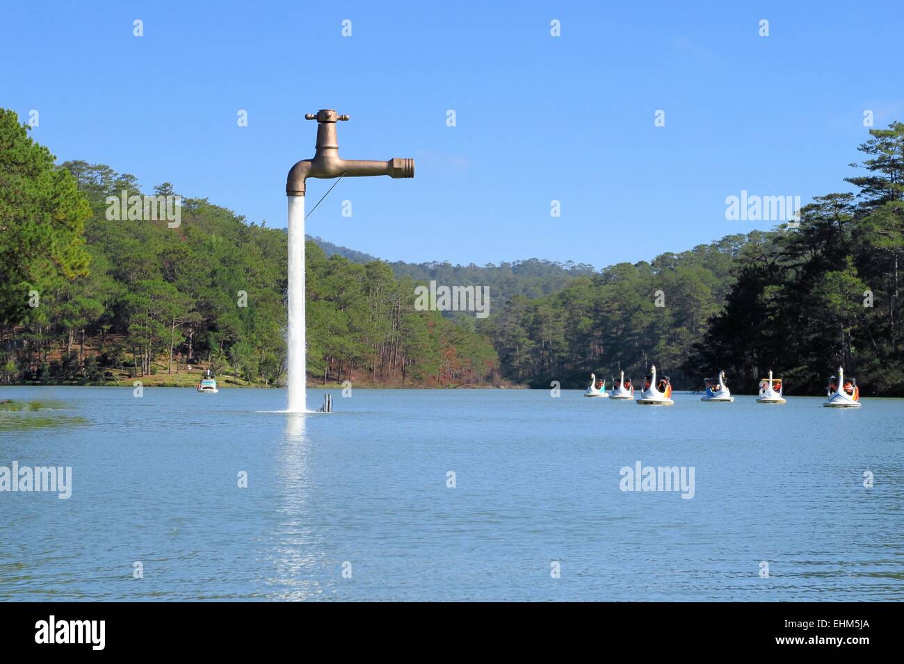 Free standing faucet floating over a lake Stock Photo - Alamy