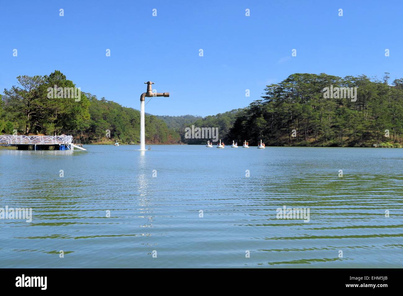 Free standing faucet floating over a lake Stock Photo - Alamy