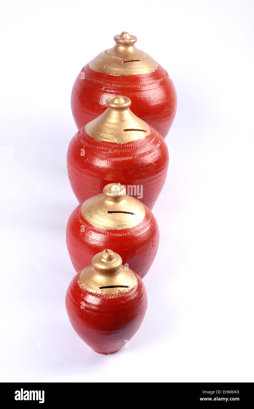 Earthen pot is a coin box of rural India called Gullak Stock Photo - Alamy