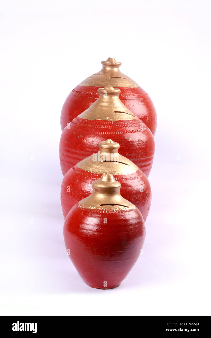 Earthen pot is a coin box of rural India called Gullak Stock Photo - Alamy
