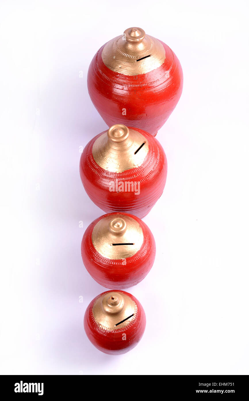 Earthen pot is a coin box of rural India called Gullak Stock Photo - Alamy