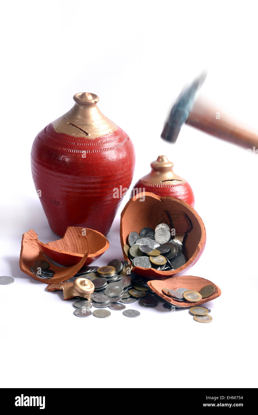Earthen pot is a coin box of rural India called Gullak Stock Photo - Alamy