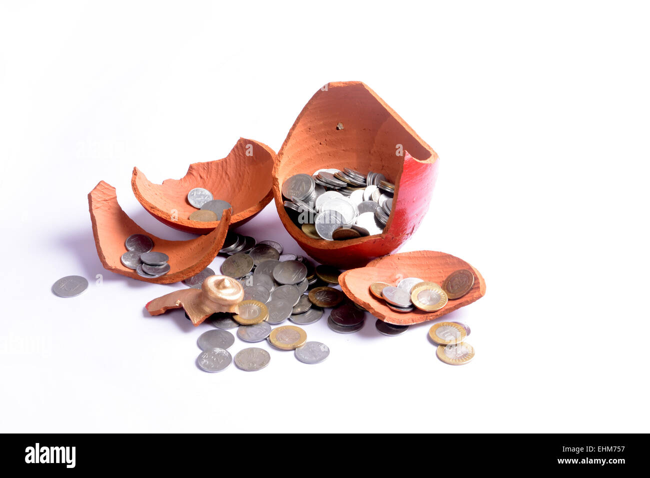 Earthen pot is a coin box of rural India called Gullak Stock Photo - Alamy