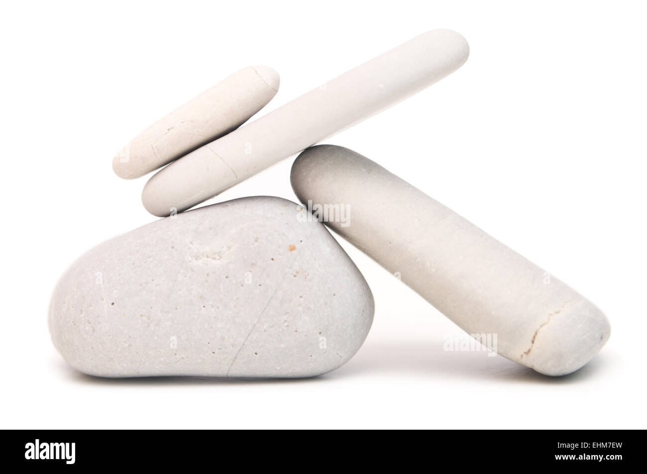 white balancing stones isolated on white background Stock Photo - Alamy