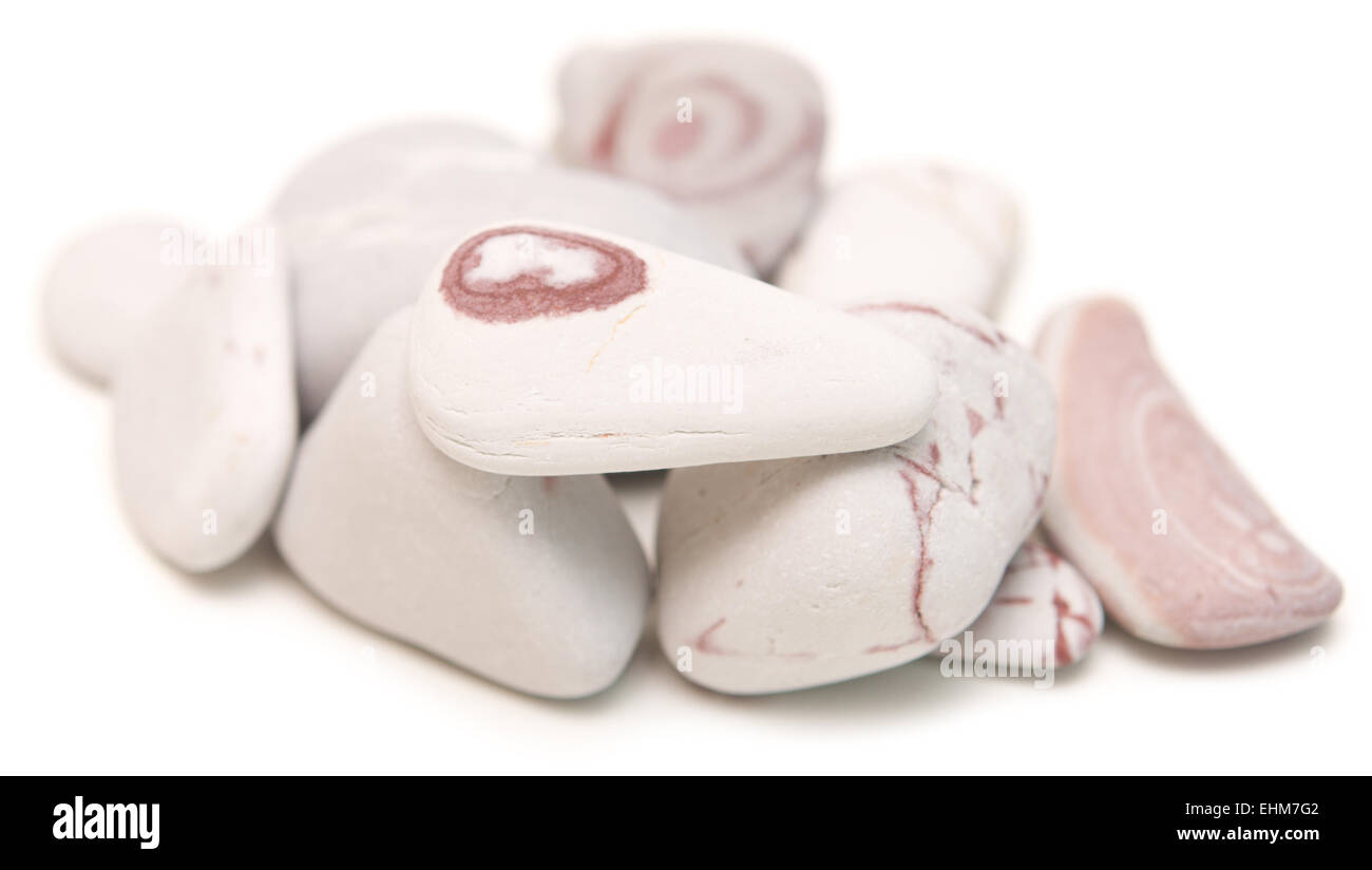 sea smooth stones isolated on white background Stock Photo - Alamy