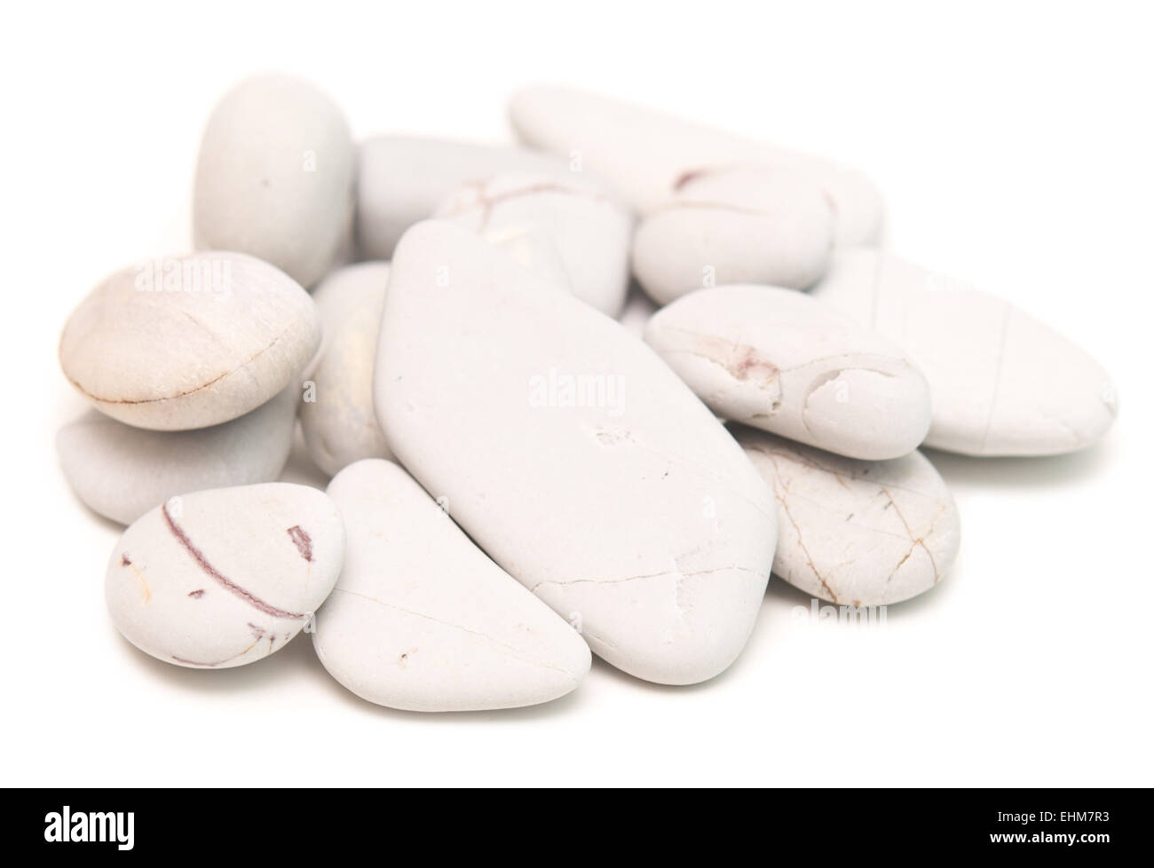 pile of sea smooth stones isolated on white Stock Photo - Alamy