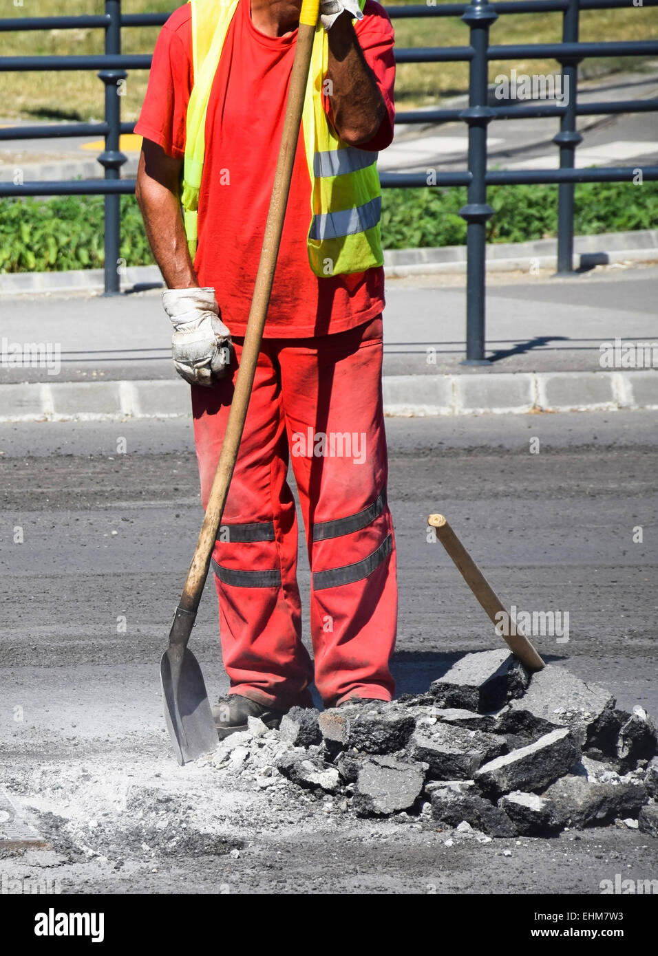 Man is working at the road construction Stock Photo - Alamy
