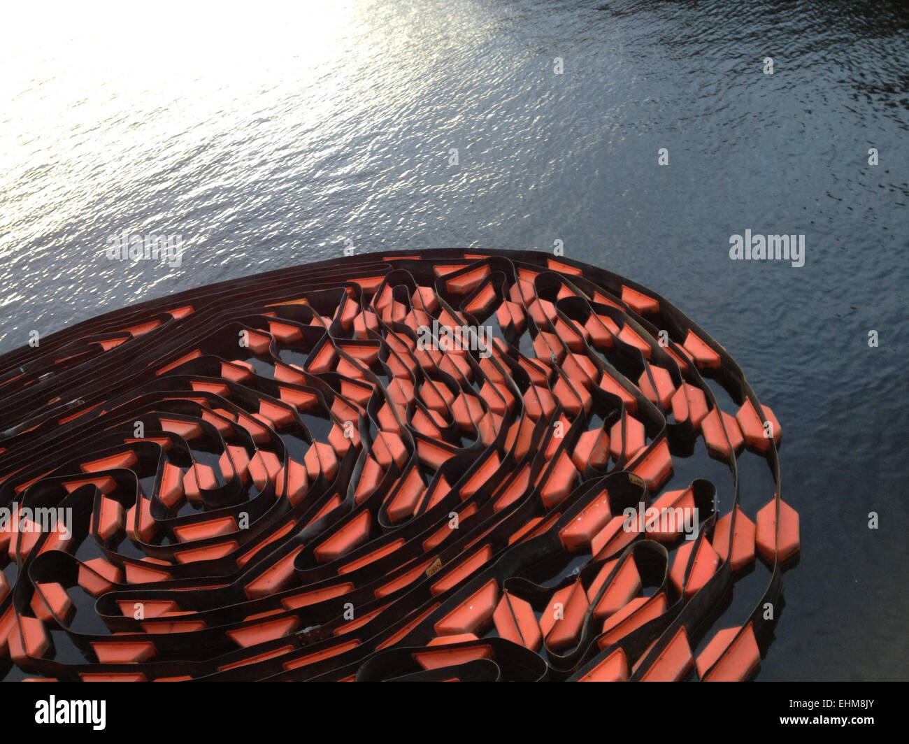 High angle view of coiled buoys floating in water Stock Photo - Alamy