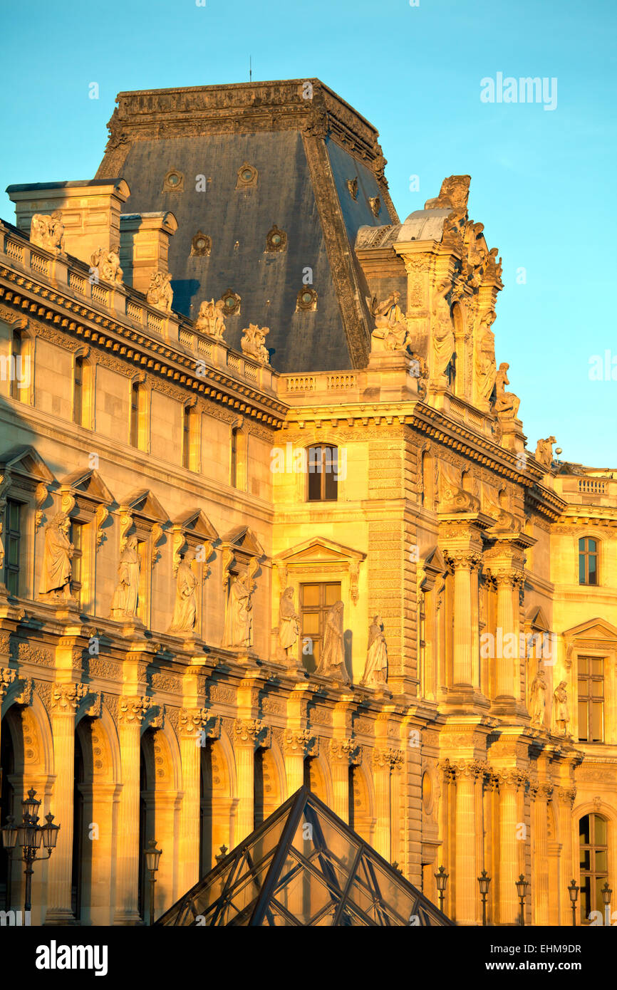 The Louvre Palace and Pyramid before sunset, Paris, France Stock Photo ...