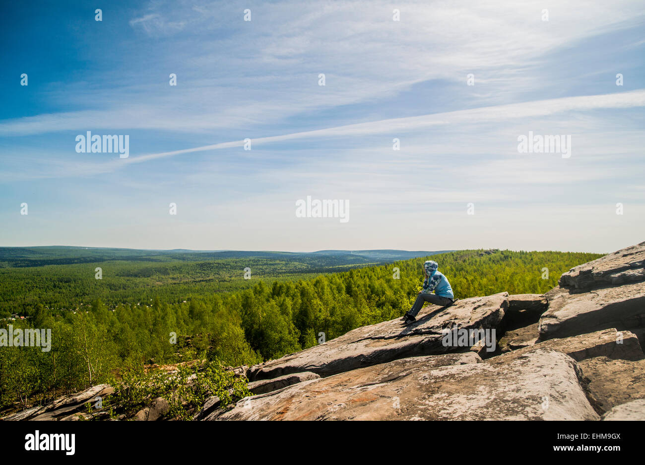Caucasian climber sitting on rock formation Stock Photo - Alamy