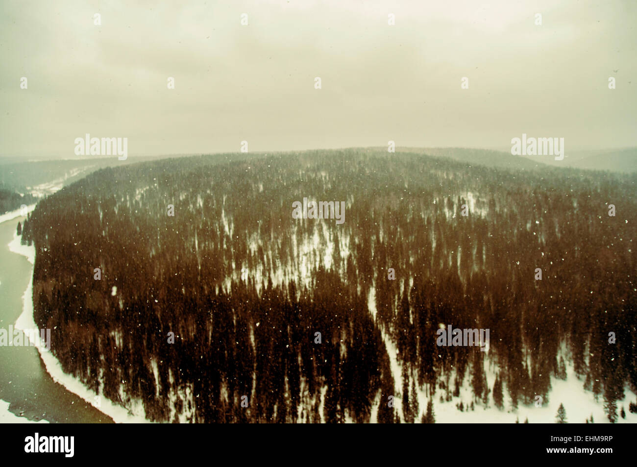 Aerial view of snowy remote forest Stock Photo - Alamy