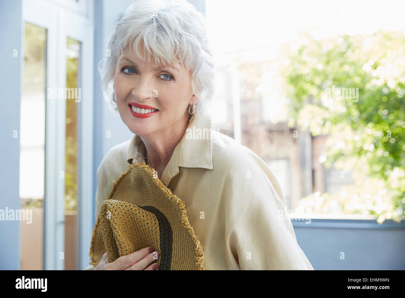 Portrait smiling older woman outdoors hi-res stock photography and ...