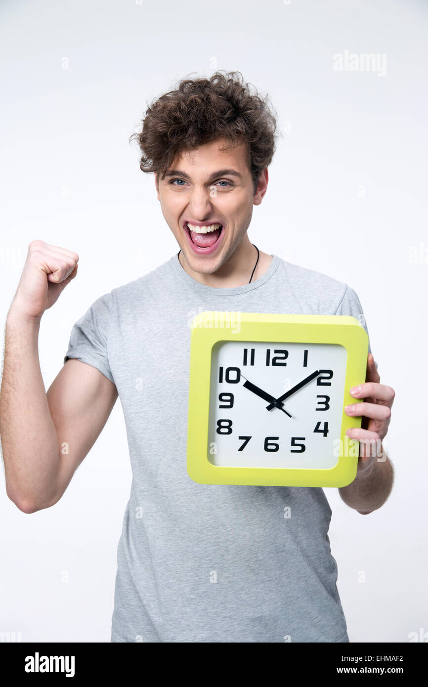 Man with clock hi-res stock photography and images - Alamy