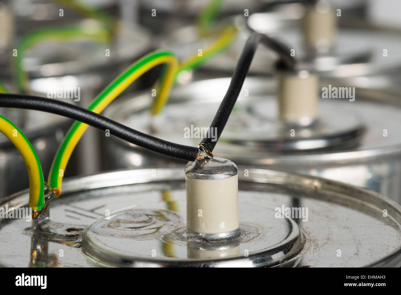Dangerous monster sized capacitors wired in parallel with heavy gage ...