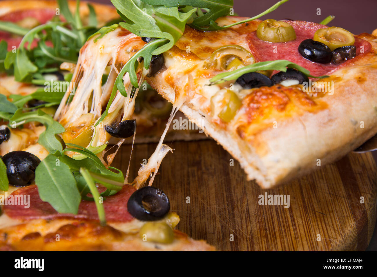 Pizza salami green leaves hi-res stock photography and images - Alamy