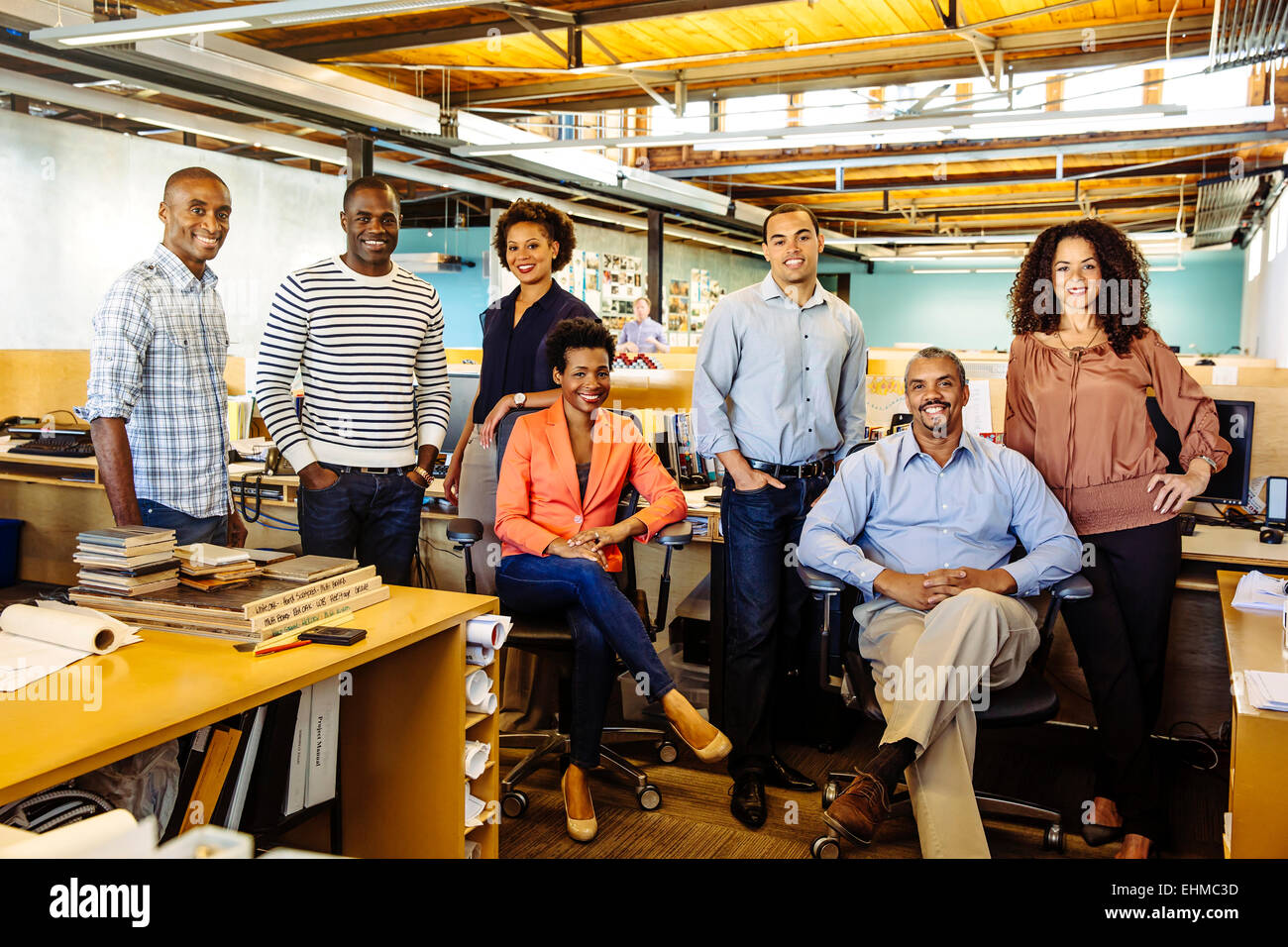 Business people smiling in office Stock Photo - Alamy