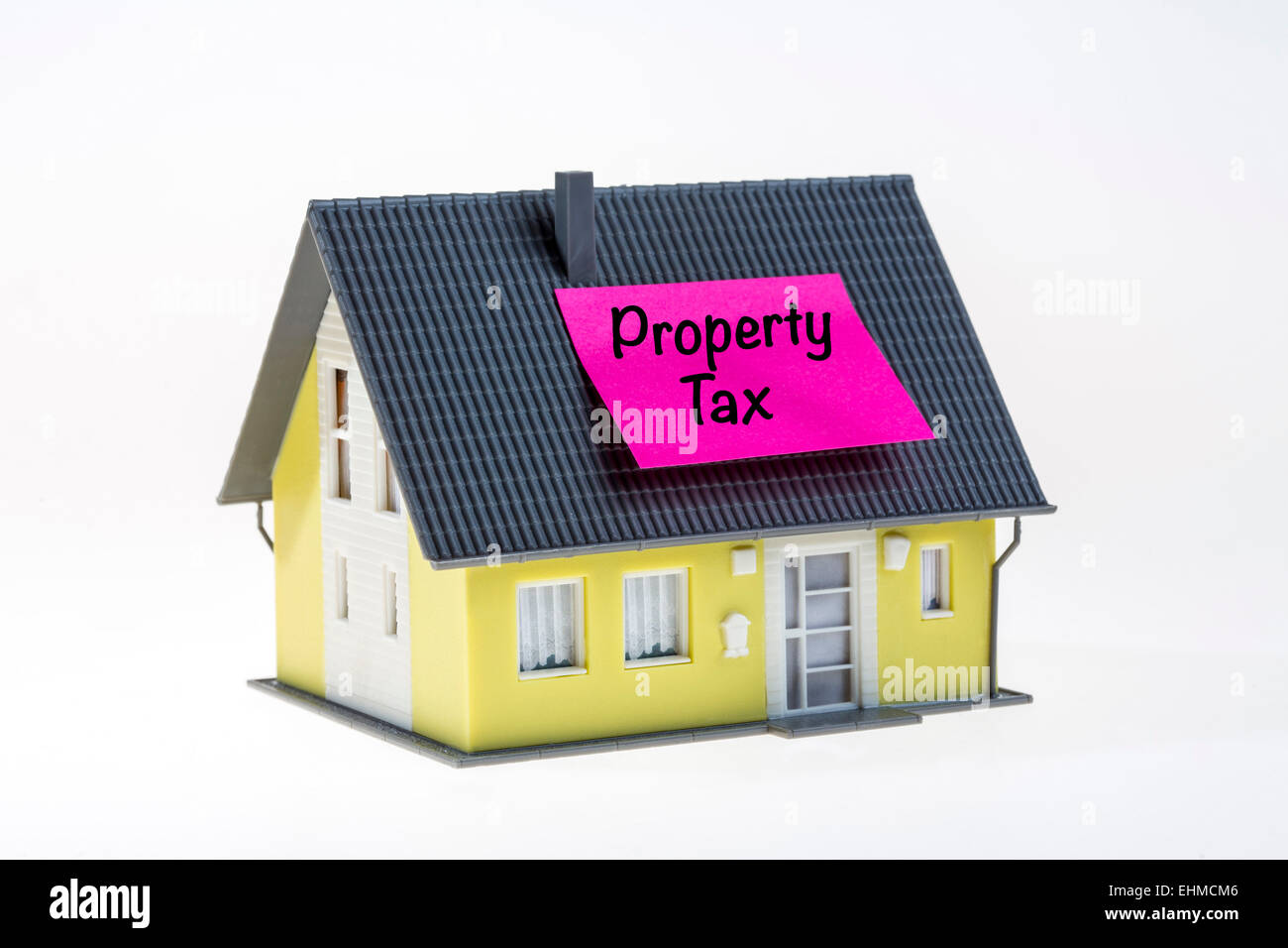 Symbolic image, house with a Post-it note, property tax Stock Photo - Alamy