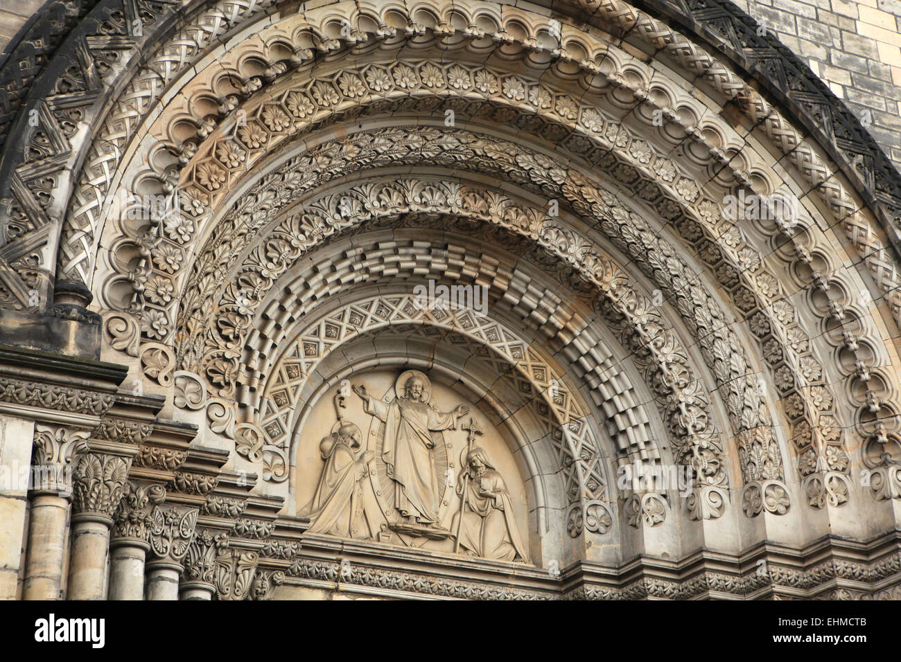 Jesus Christ blesses to St Cyril and Methodius. Romanesque portal of St ...