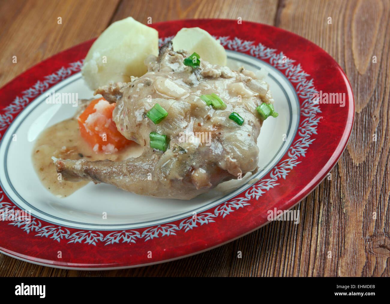 baked rabbit with vegetables. close up Stock Photo - Alamy