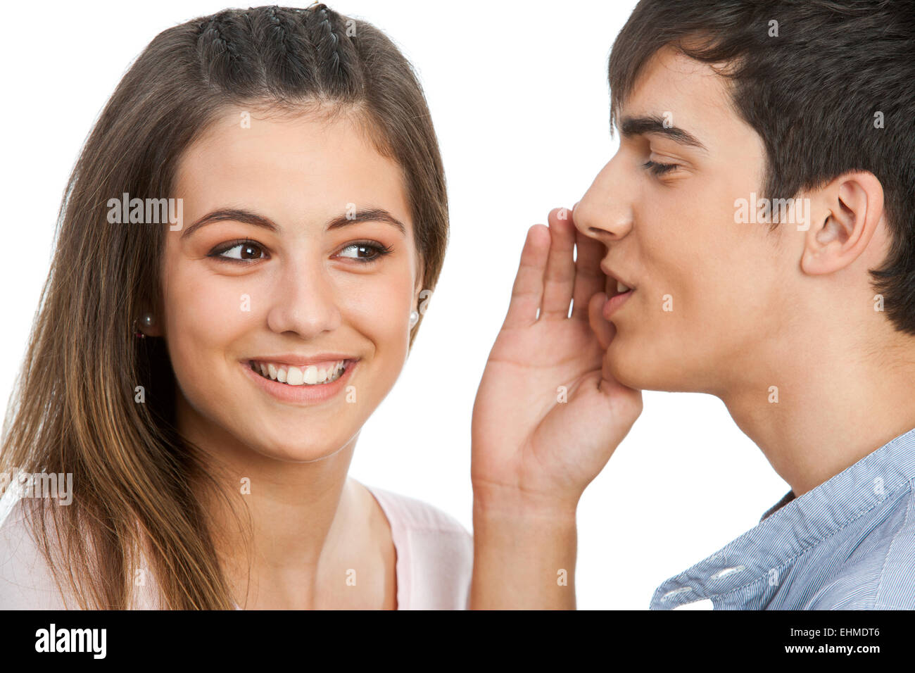 Close up of boy whispering to cute girl.Isolated on white Stock Photo ...