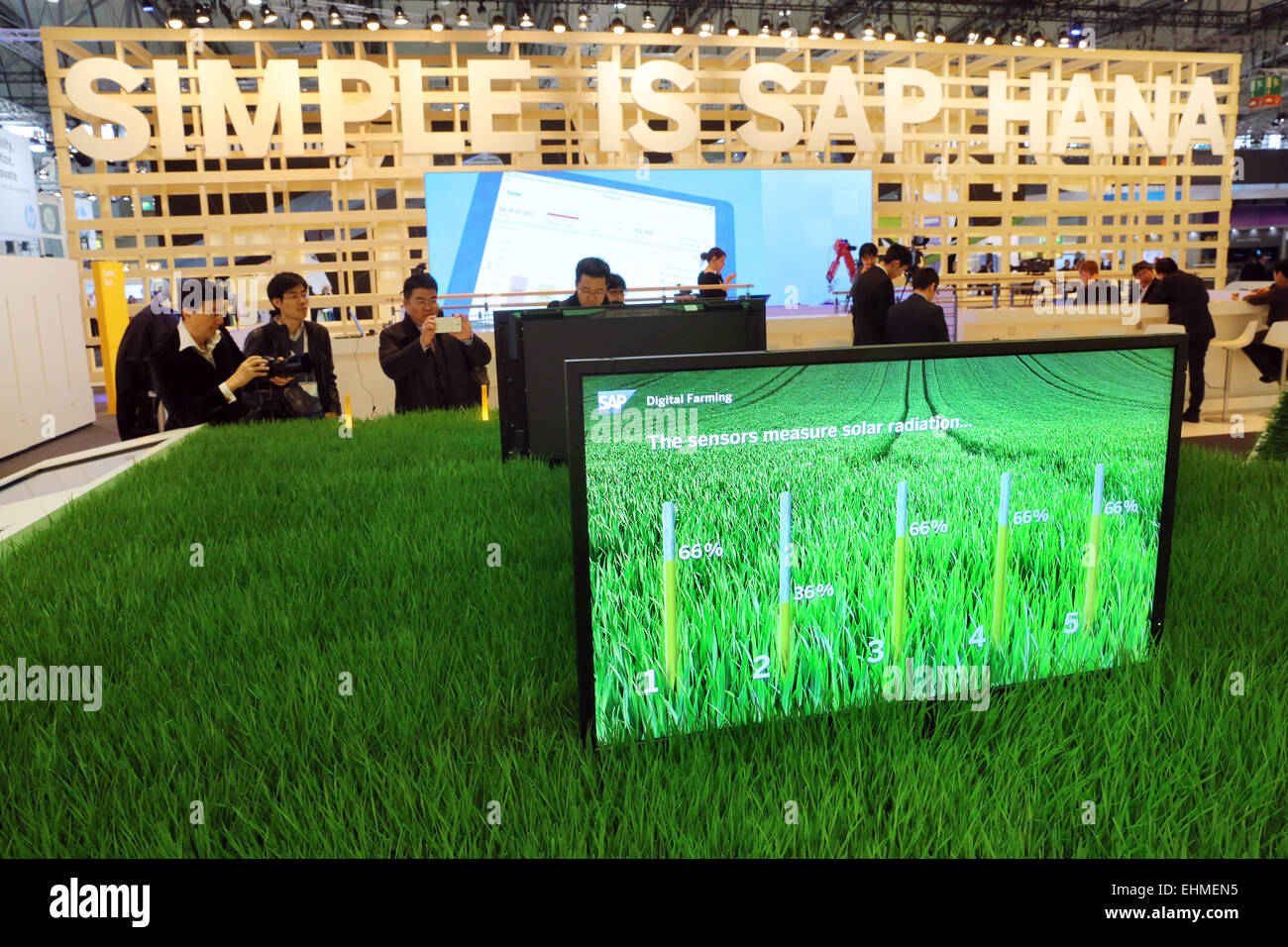 Digital farming with a real wheat field on the stand of SAP software ...