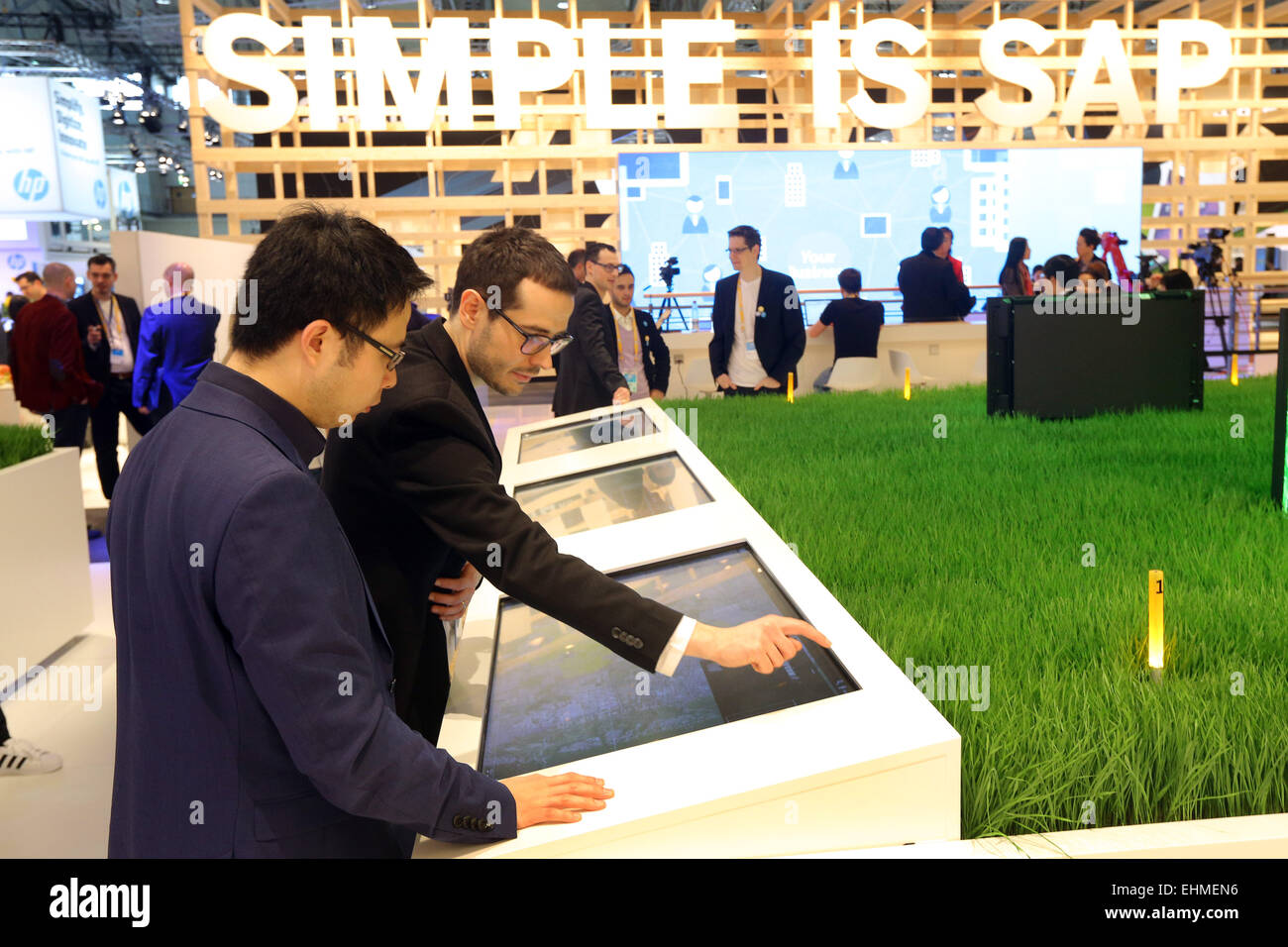 Digital farming with a real wheat field on the stand of SAP software ...