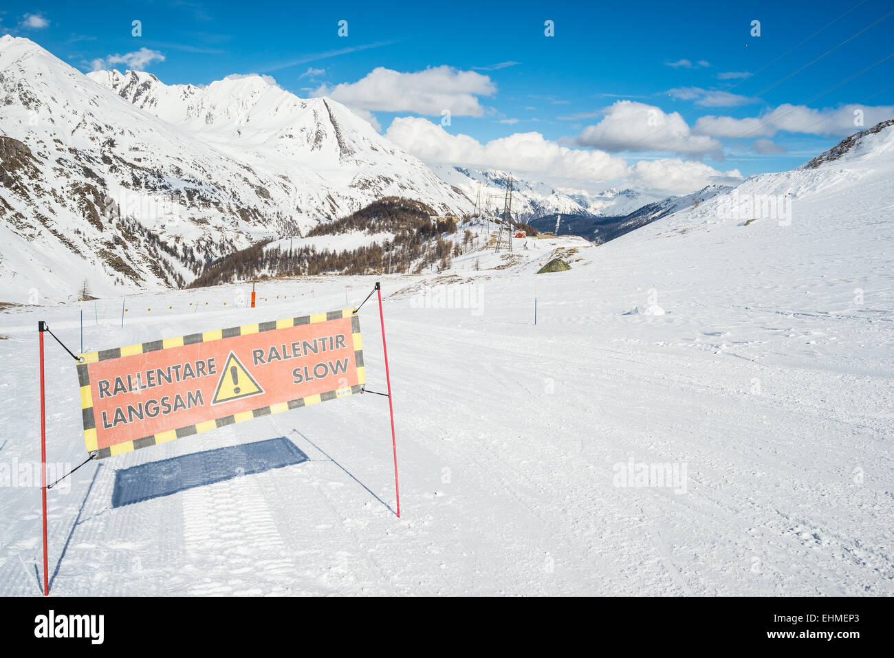 "Slow skiing" warning sign on ski slope in ski resort with majestic ...