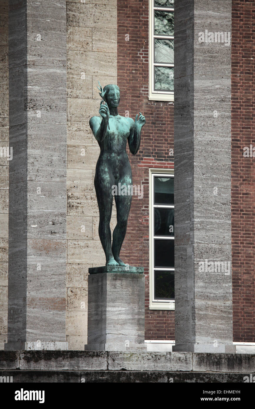 Female Winner (1936). Bronze statue by Arno Breker in front of the ...