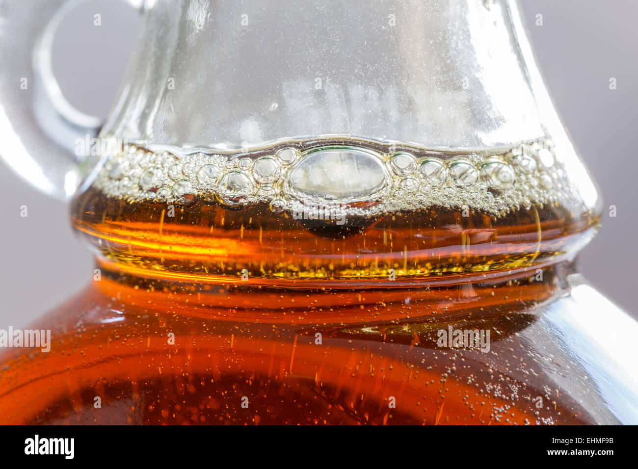 Maple syrup in a bottle in detail Stock Photo - Alamy