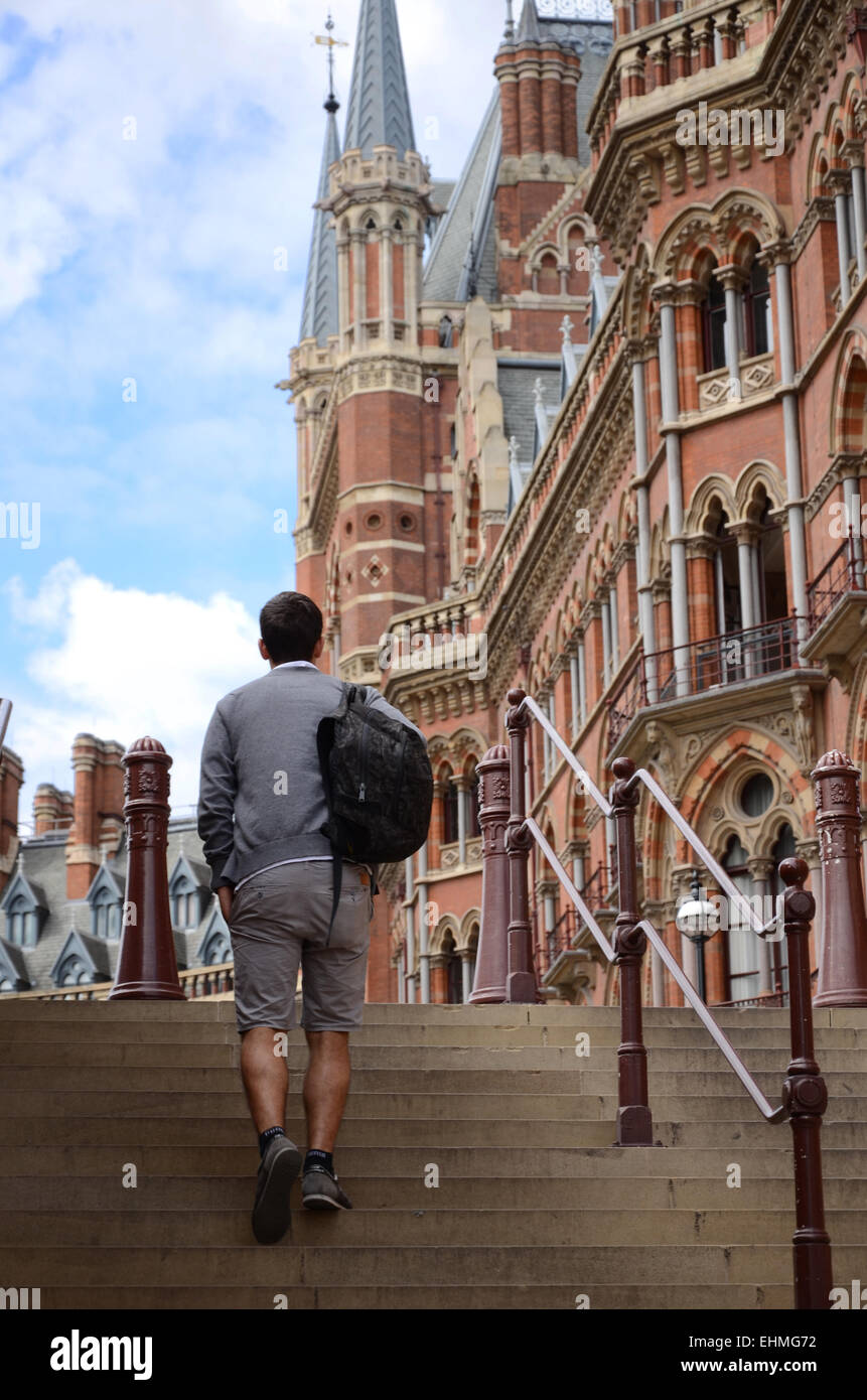Tourist climbing steps from Liverpool Street Station Stock Photo - Alamy