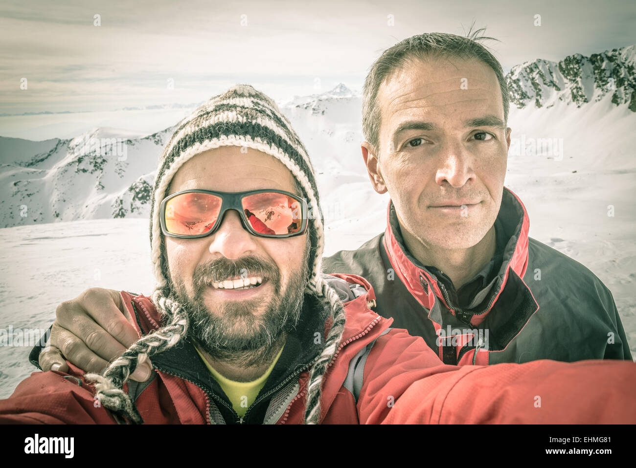 Two tired men climbing up hi-res stock photography and images - Alamy