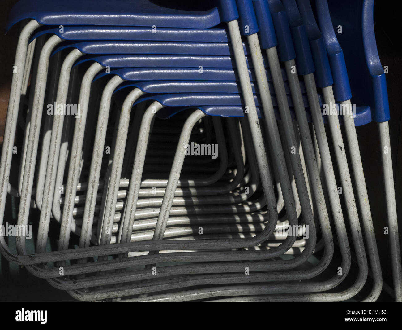 Stacked chairs hi-res stock photography and images - Alamy